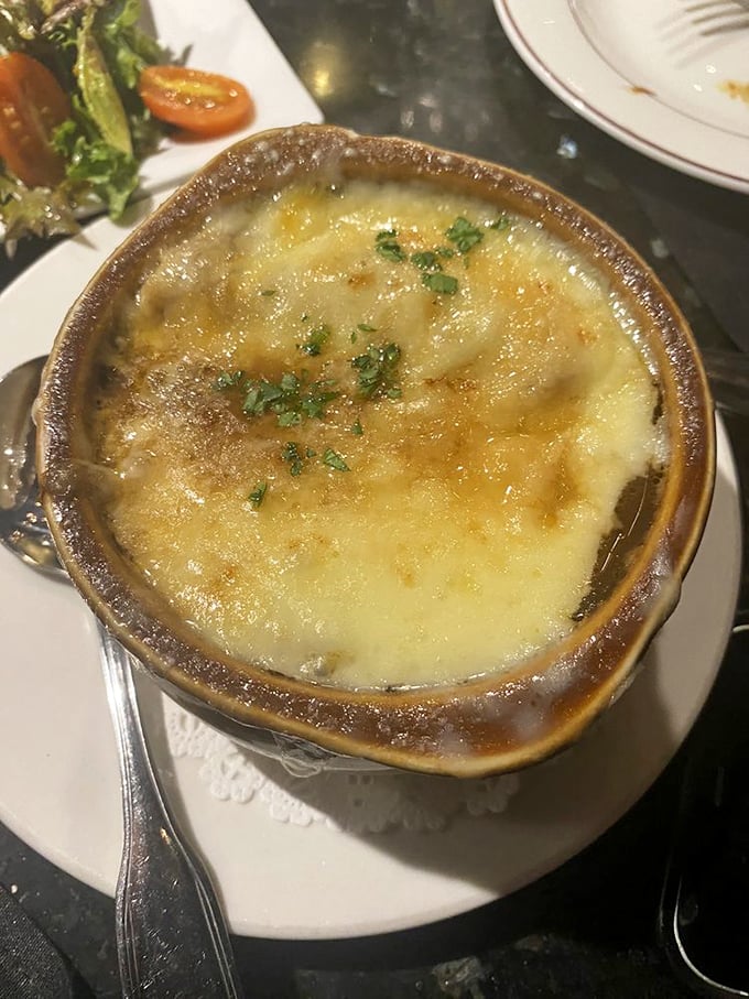 The crown jewel: French onion soup with a cheese pull that deserves its own slow-motion sequence. Broiled to golden perfection and worth every calorie.