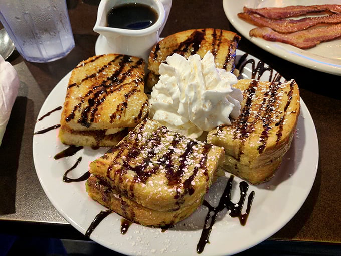 French toast that looks like it graduated from culinary school with honors&mdash;golden, griddled perfection crowned with chocolate drizzle and whipped cream.