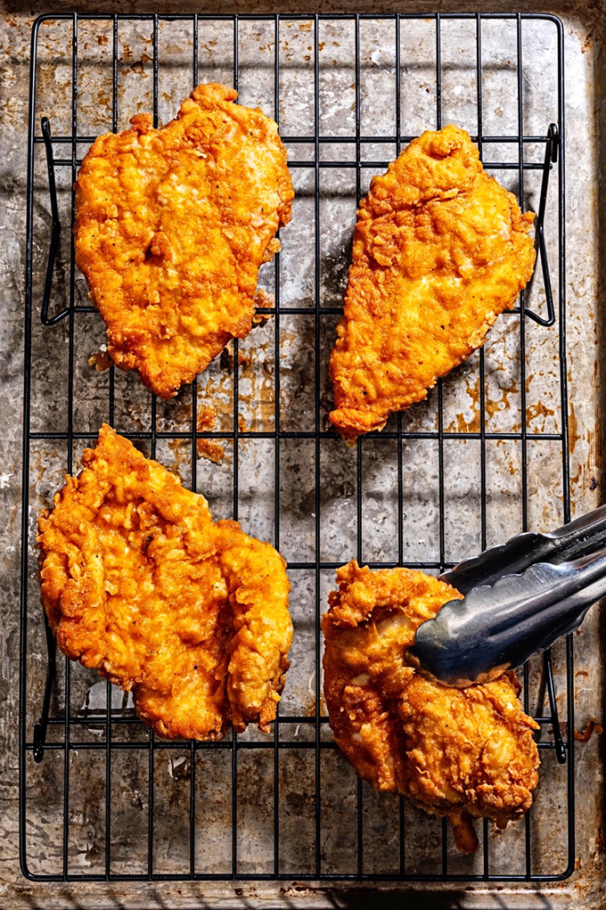Golden-brown perfection that makes other fried chicken look like it's not even trying. The crunch heard 'round Virginia.