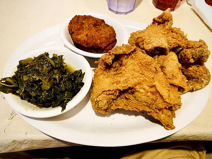 Golden-crusted fried chicken alongside collards swimming in pot likker&mdash;a plate that's sparked more Georgia joy than winning the lottery.