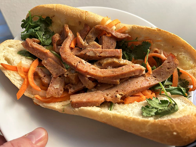 This Vietnamese ham banh mi isn't just a sandwich&mdash;it's architecture of flavor with layers of meat, herbs, and pickled vegetables in perfect harmony. 