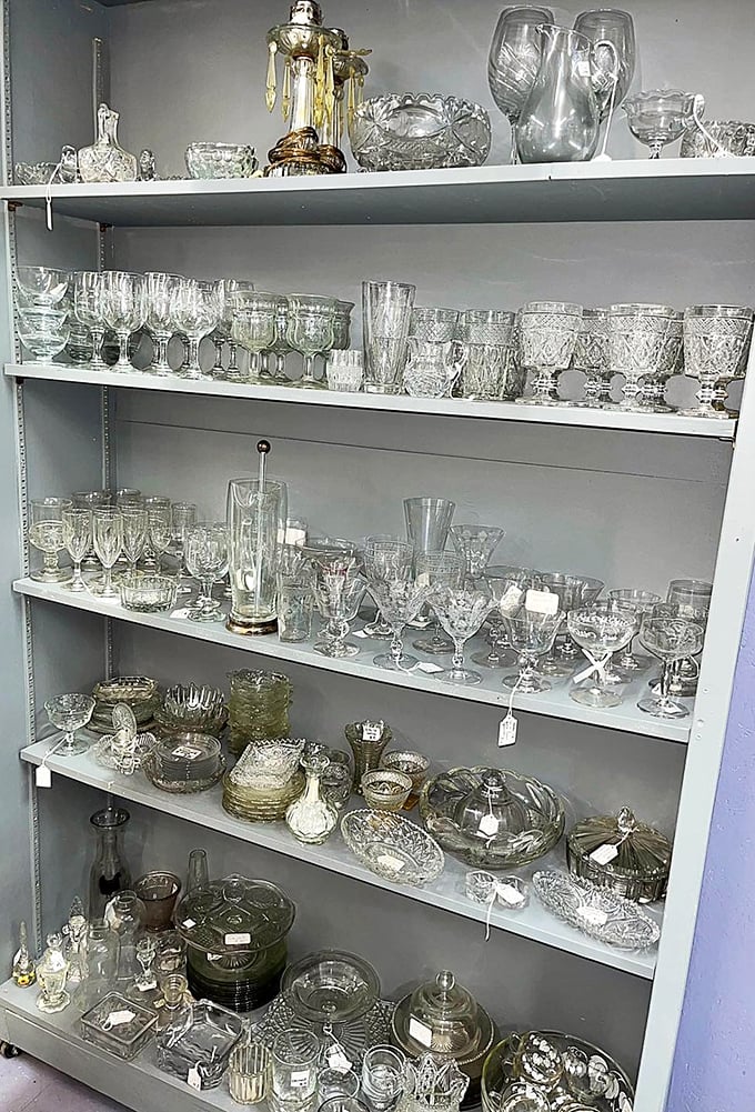 Crystal kingdom! Generations of elegant dinner parties and holiday celebrations sparkle on these shelves, waiting for new tables to grace.