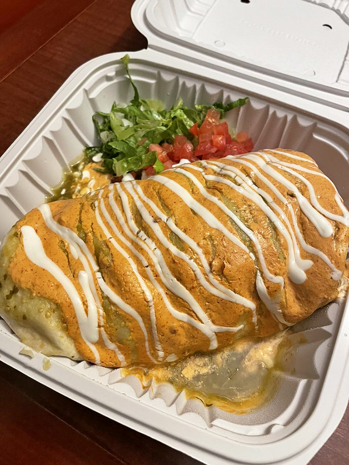 This burrito isn't just wrapped—it's embraced by a tortilla and baptized in sauce that makes you want to write home about it.