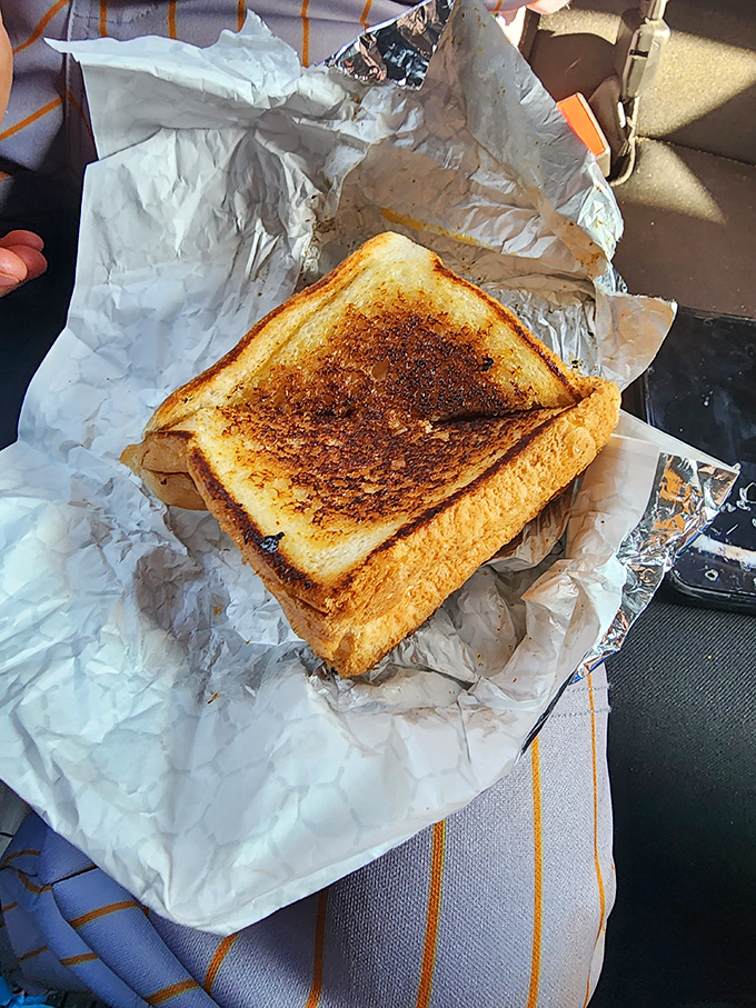 Golden-brown perfection between bread! This grilled cheese isn't just cooked, it's been lovingly introduced to heat at precisely the right moment.