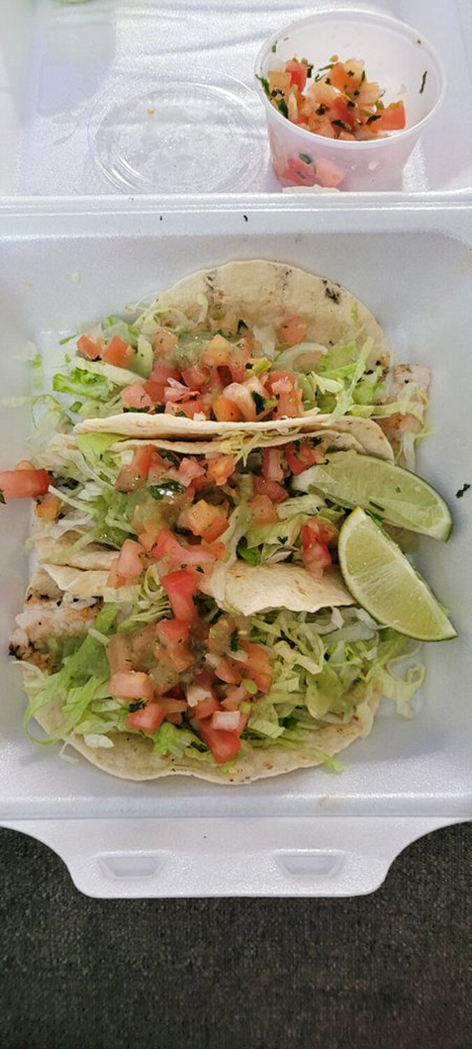These fish tacos aren't just food; they're edible sunshine. Fresh tilapia, crisp lettuce, and pico de gallo create the perfect harmony in every bite.