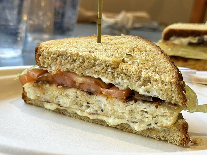 This halibut sandwich isn't just lunch&mdash;it's a religious experience between two slices of bread. The tomato adds color, but the fish is the undisputed star.