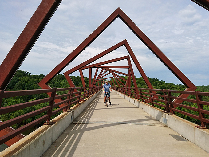 The High Trestle Trail bridge transforms a simple crossing into an optical illusion worthy of a modern art museum. Cyclists get gallery-quality views for free.