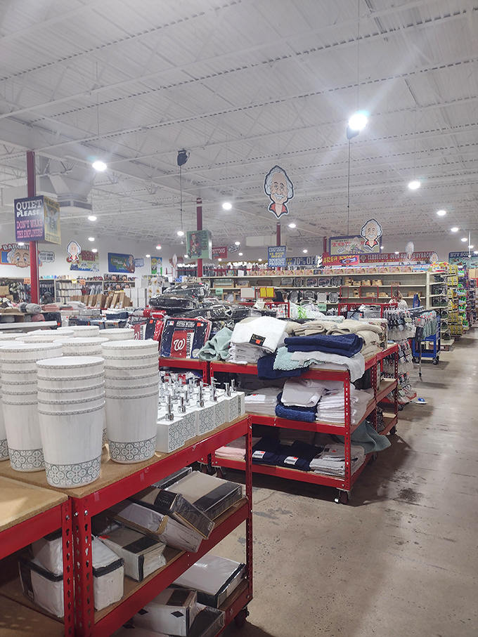 White decorative planters and neatly folded towels create an oasis of home essentials. Martha Stewart would approve of the selection, if not the warehouse aesthetic.