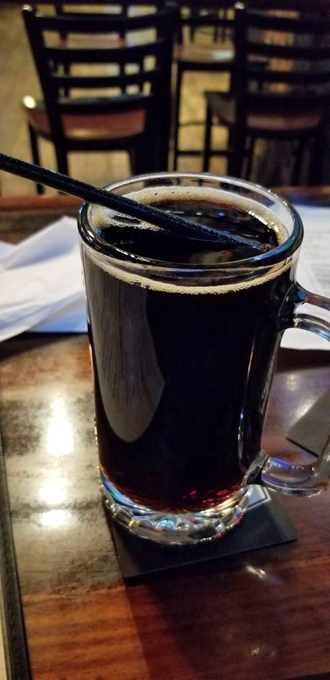 This isn't your average convenience store root beer. Served in a frosted mug with that perfect foam head—nature's way of saying "drink me now."