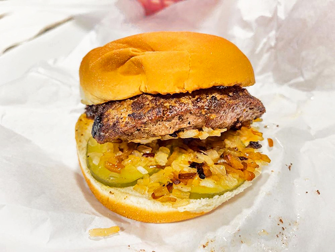Meet the star of the show&mdash;a burger that doesn't need fancy toppings when it's hiding a molten secret beneath its charred exterior.