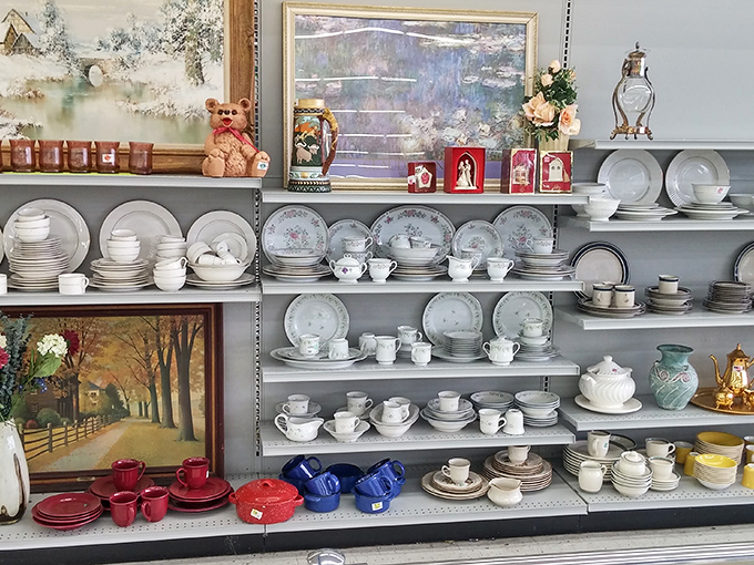Dish heaven! From mid-century modern serving platters to grandma-approved teacups, these shelves hold the ghosts of thousands of family dinners past.