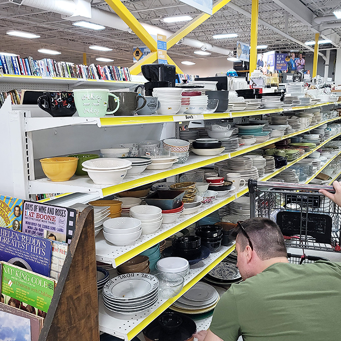 Dish paradise! From mid-century Pyrex to forgotten wedding china, these shelves hold more family dinner potential than a Thanksgiving reunion.