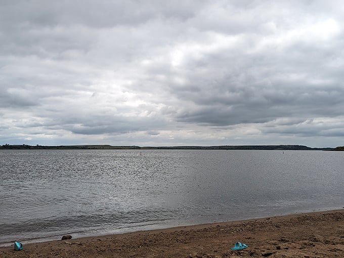 Moody waters, endless skies: Even on overcast days, Kanopolis Lake offers a tranquil escape where water meets horizon in perfect harmony.