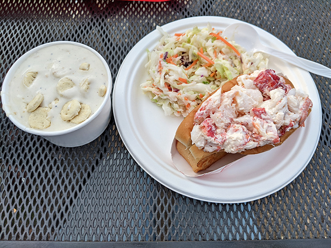 The holy trinity of New England dining: a perfectly stuffed lobster roll, creamy clam chowder, and the anticipation of that first heavenly bite.