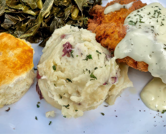 Behold the star of our story&mdash;mashed potatoes that could make a grown person weep with joy. Flecked with herbs and hiding bits of red onion.
