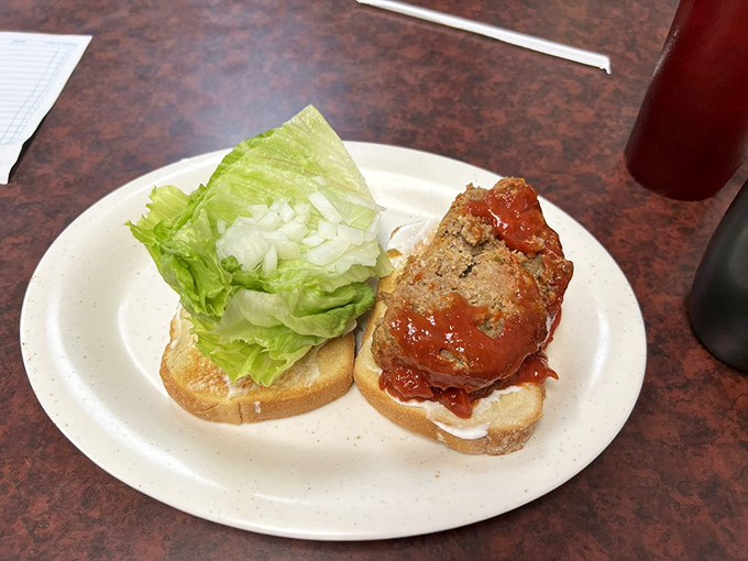 The sandwich that launched a thousand return visits. This open-faced meatloaf creation doesn't need fancy plating&mdash;it knows exactly what it is.