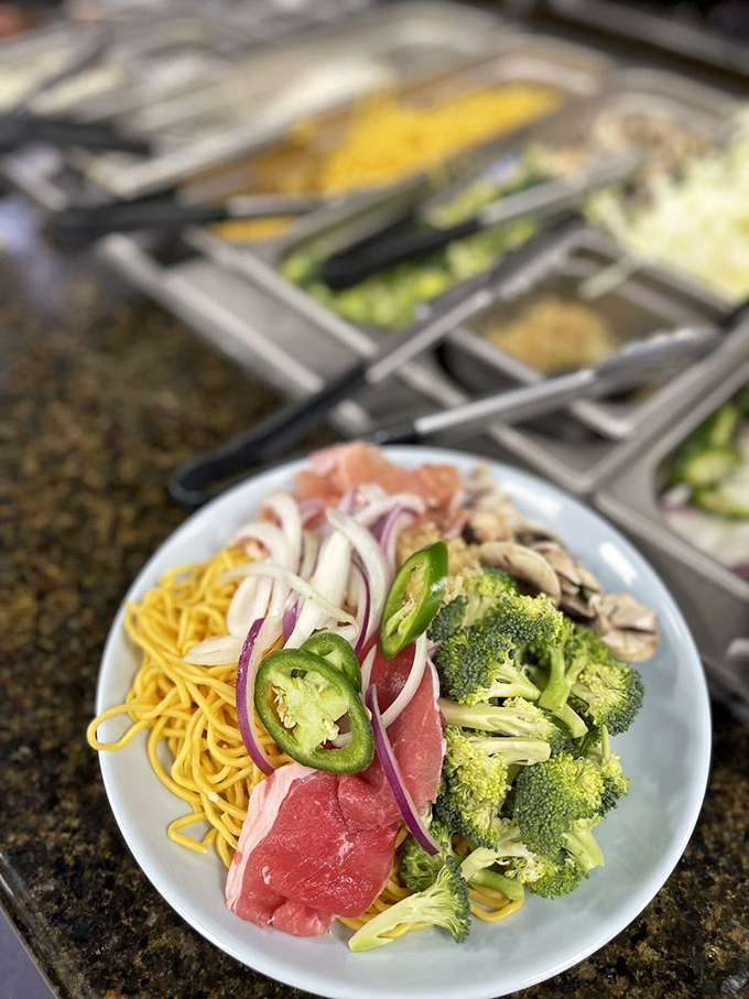 Build-your-own stir-fry heaven awaits! Fresh ingredients lined up like eager contestants on a delicious reality show where everyone's a winner&mdash;especially your taste buds. 