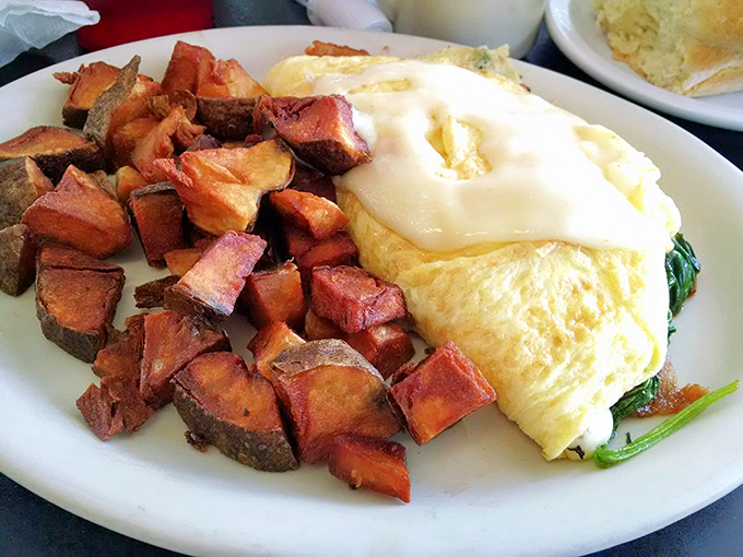 This omelet doesn't just whisper "good morning"&mdash;it belts out "HELLO SUNSHINE!" with every cheese-filled bite. 