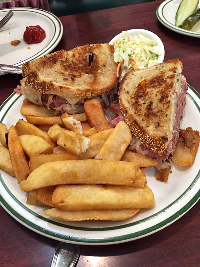 Behold the architectural marvel that is a proper Reuben. The golden-grilled rye, the generous meat-to-bread ratio&mdash;this is sandwich engineering at its finest.