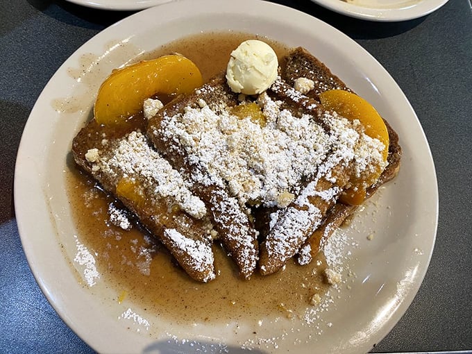 The Peach Cobbler French Toast isn't just breakfast, it's Georgia on a plate &ndash; complete with shortbread crumble and powdered sugar snow.