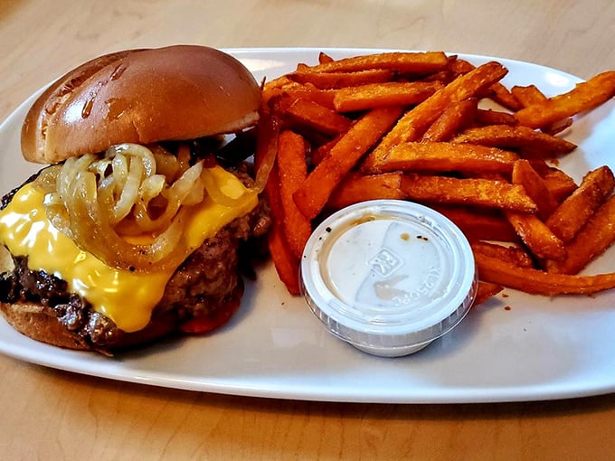 This isn't just a Philly burger—it's Philadelphia's greatest hit in handheld form. Those sweet potato fries deserve their own fan club.
