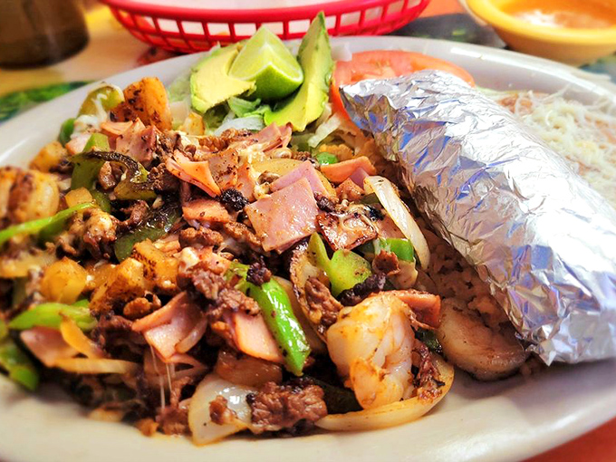 This plate doesn't just feed your hunger&mdash;it feeds your soul. Perfectly seasoned meat, fresh avocado, and a burrito that demands respect.