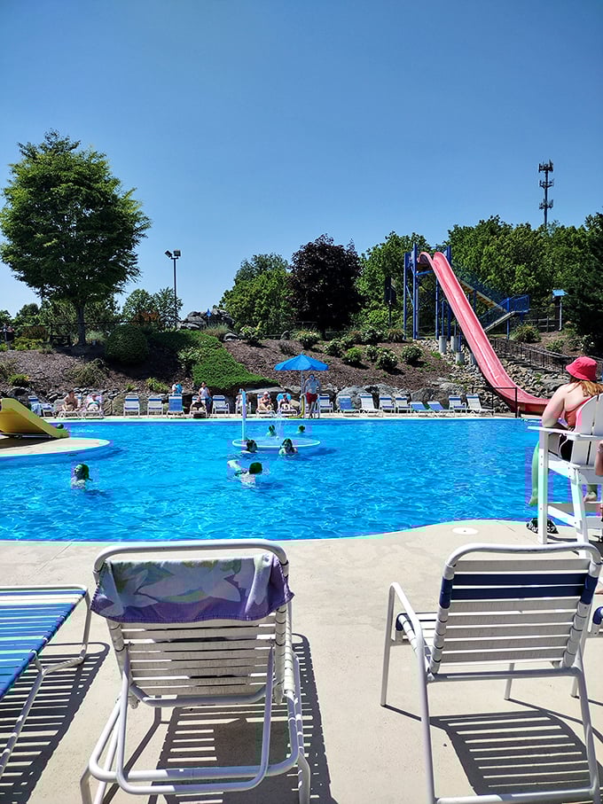 Summer paradise found! The sparkling pool complete with water slide offers the perfect cool-down after heated go-kart rivalries.