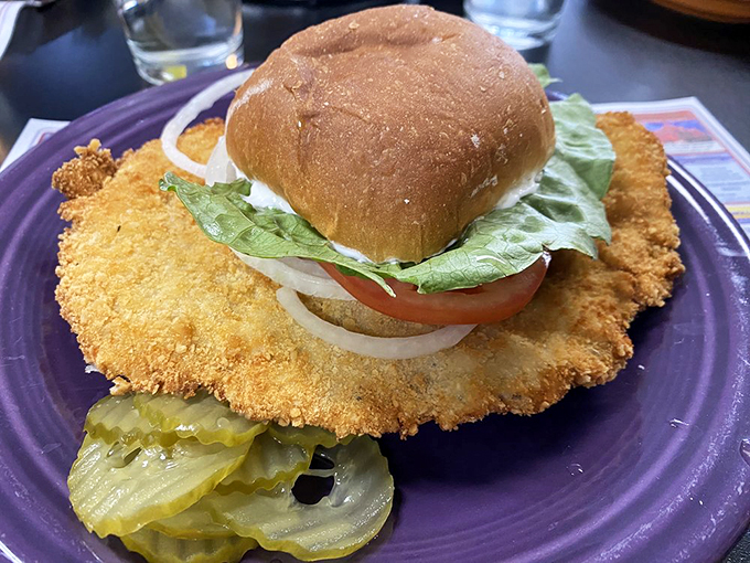 Behold the legendary breaded pork tenderloin&mdash;a golden-fried masterpiece that laughs at the concept of bun proportionality.