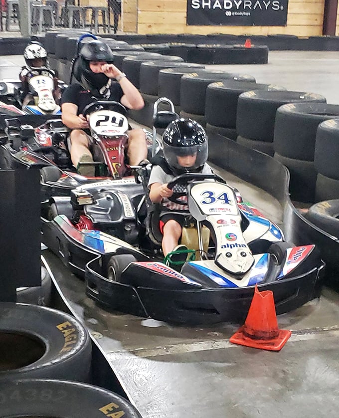 Kids learning that life in the fast lane starts early. That focused look says, "Move over, Dad, a future champion's coming through."