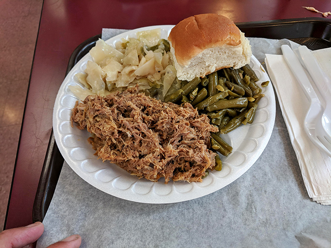 Eastern North Carolina barbecue done right&mdash;tender pulled pork sharing space with cabbage and green beans that haven't forgotten their Southern roots.
