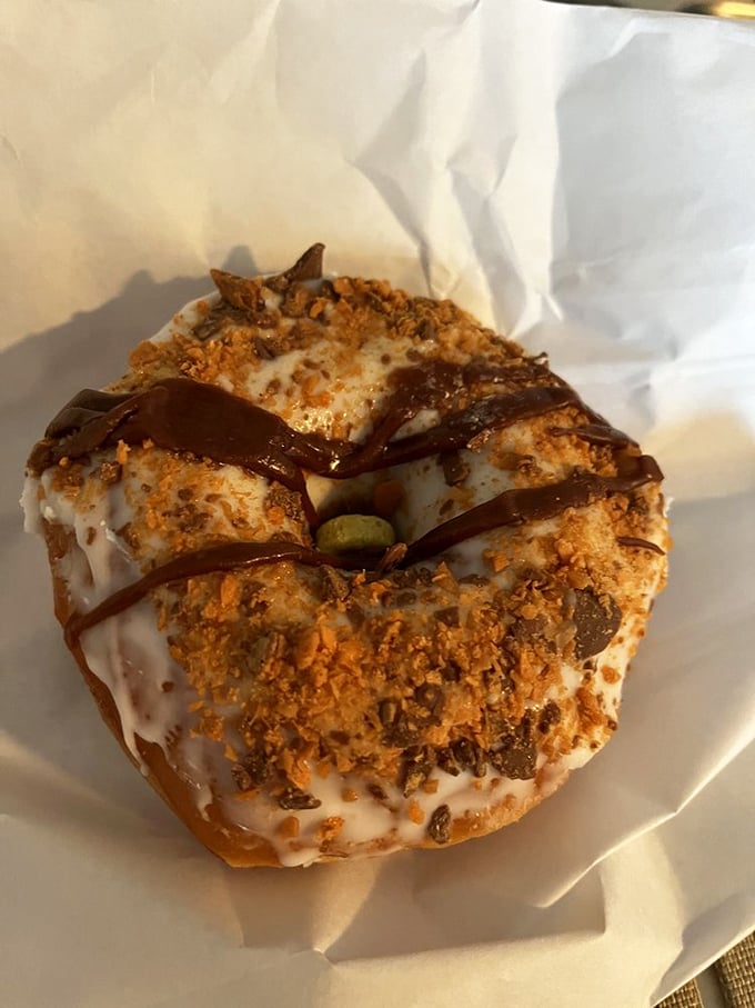 This isn't just a donut&mdash;it's a work of confectionery engineering where peanut butter meets chocolate in a relationship more perfect than any Hollywood romance.
