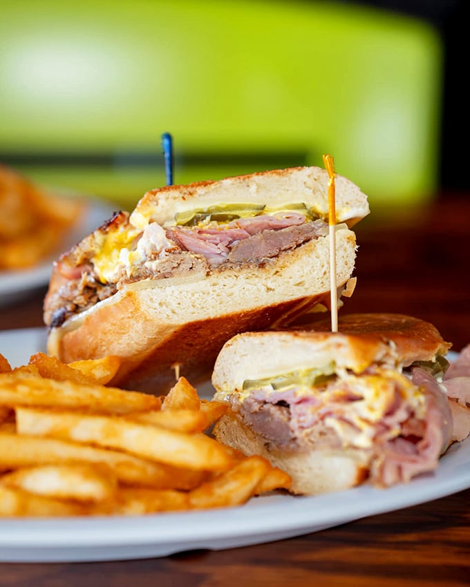 The classic club sandwich: where turkey, bacon, and proper bread-to-filling ratio come together in perfect harmony. Architectural integrity matters.