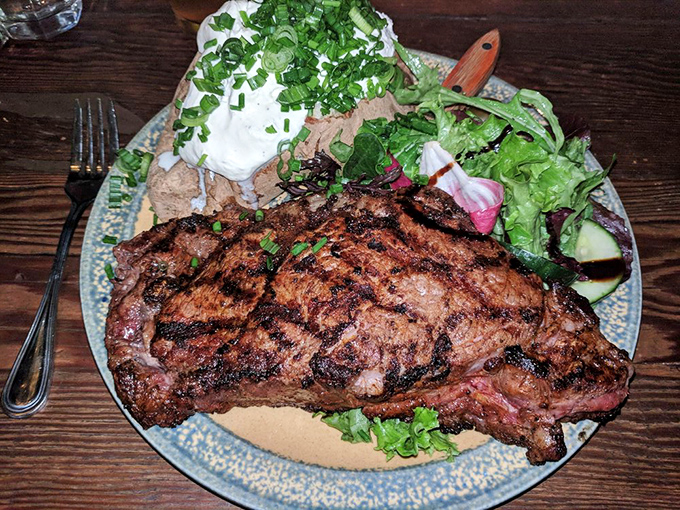 This isn't just a steak; it's a carnivore's sonnet with grill marks. The char-to-juicy ratio would make even vegetarians reconsider their life choices.