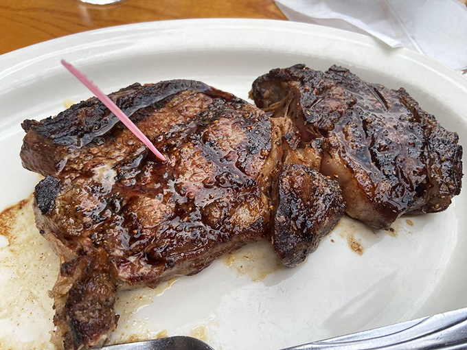 Behold the star of the show: a ribeye so perfectly caramelized it should have its own Instagram account.