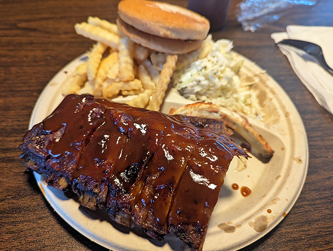 This isn't just meat with sauce; it's a tender slice of Mississippi heritage glistening with decades of pit-smoking wisdom. 