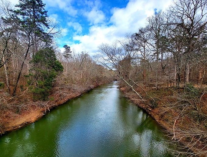 Mother Nature's mirror: Where the Mississippi sky meets its reflection, creating twice the beauty for exactly zero dollars.