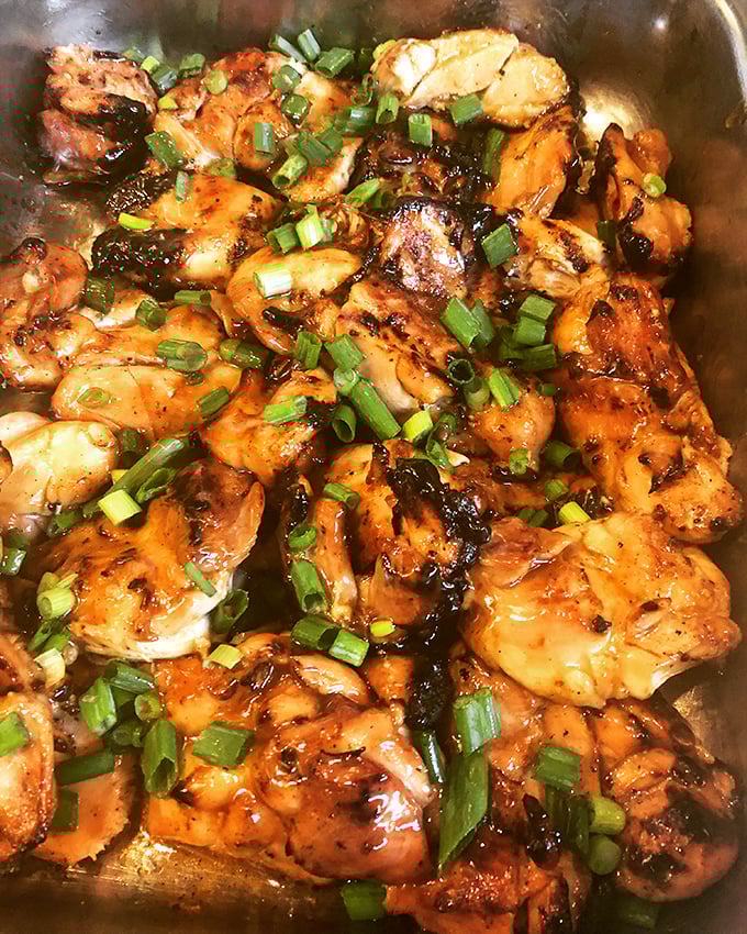 This isn't just chicken&mdash;it's a glistening, caramelized love letter to poultry, topped with green onions for that "I'm fancy but approachable" vibe.