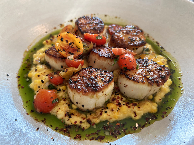 These seared scallops aren't just dinner&mdash;they're little golden medallions of Chesapeake treasure resting on a throne of creamy corn.
