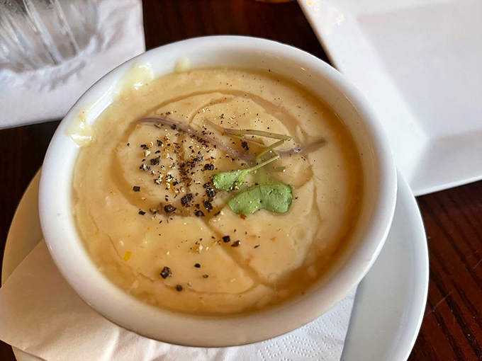 This isn't just soup&mdash;it's liquid Southern heritage. The she-crab soup arrives crowned with fresh herbs and a richness that makes you want to propose marriage to your spoon.