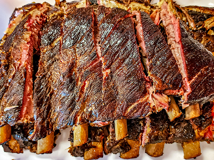Behold the holy grail of Kansas BBQ&mdash;ribs with that perfect pink smoke ring that makes vegetarians question their life choices.