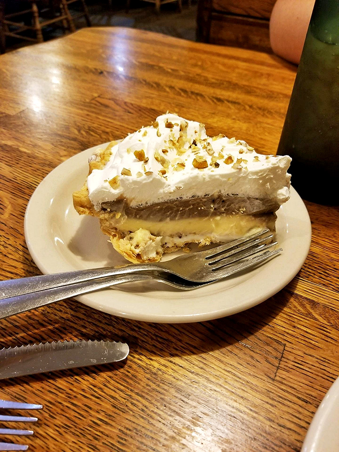 Layer upon heavenly layer, this slice of Possum Pie reveals its secrets one bite at a time—no actual possums were harmed in the making.