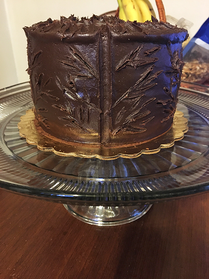 Chocolate frosting applied with the precision of a Renaissance artist. Michelangelo had his Sistine Chapel; Maryland has its Smith Island Cake.