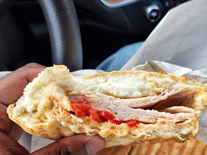 Sandwich architecture at its finest. This turkey creation showcases the perfect ratio of meat, sauce, and bread—a delicious equation solved.