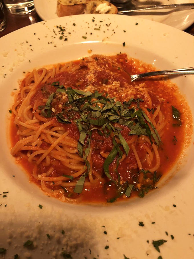 Simple spaghetti pomodoro proves the point: perfect pasta doesn't need flashy gimmicks, just bright tomato sauce and fresh basil's green confetti.