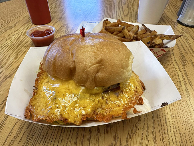 Behold the legendary Squeezeburger in all its glory! That crispy cheese skirt extending beyond the bun isn't just delicious&mdash;it's architectural genius.