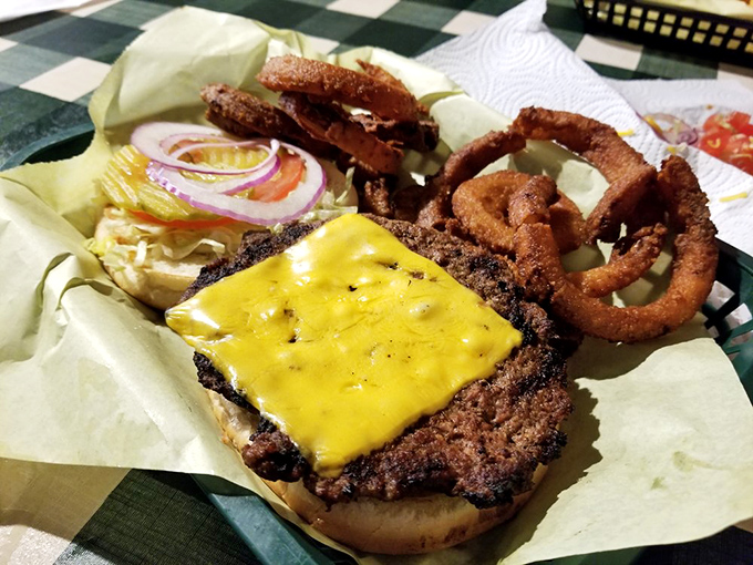 This isn't just a burger &ndash; it's a masterclass in simplicity, with a perfectly charred patty, melted cheese, and crispy onion rings that'll haunt your dreams.