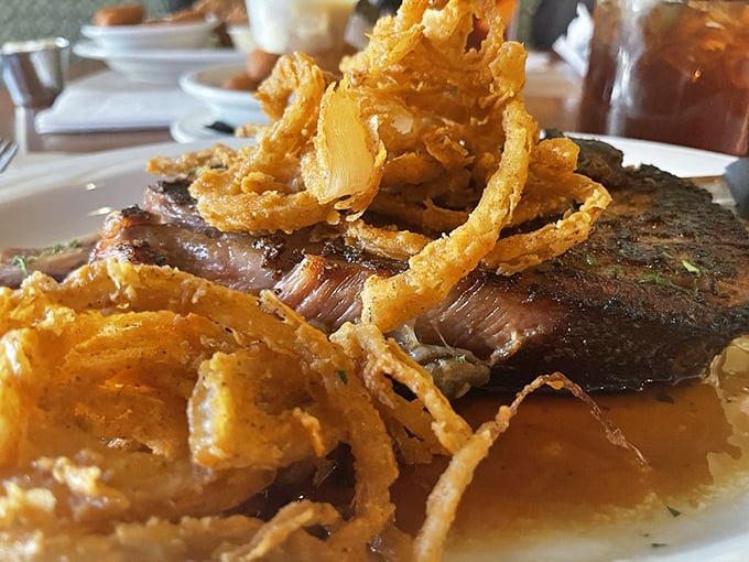 This isn't just a steak; it's a masterpiece topped with crispy onion strings that'll make you question every other steak you've ever committed to memory.