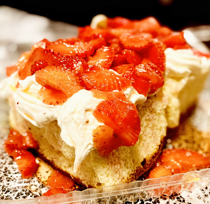 This strawberry shortcake isn't just dessert—it's a pillowy cloud of sweetness that makes you forget you just consumed your weight in beef.