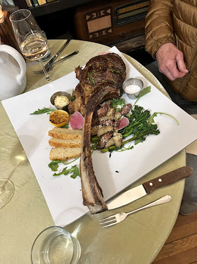That's not just a steak&mdash;it's a prehistoric monument to carnivorous desires. The tomahawk ribeye arrives with enough bone to make Fred Flintstone weep with joy.
