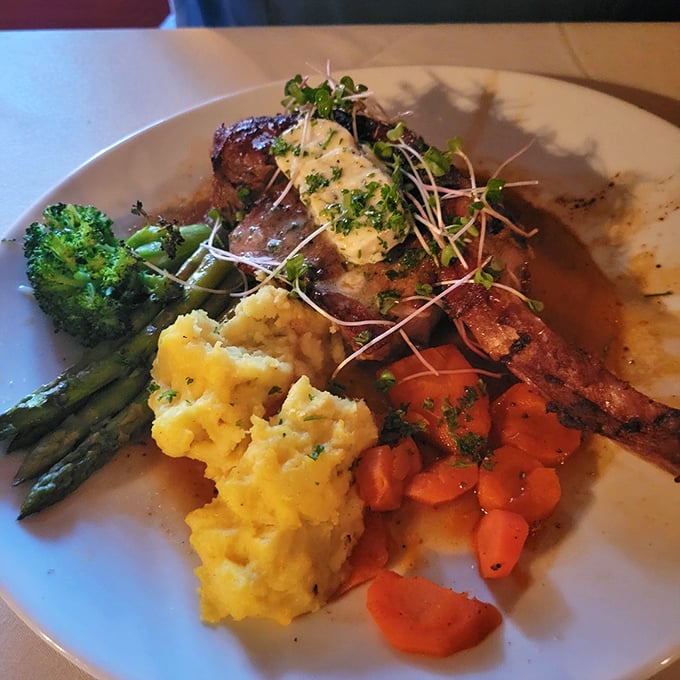 This tomahawk steak isn't just dinner&mdash;it's performance art with a bone handle. Carnivore theater at its most delicious.